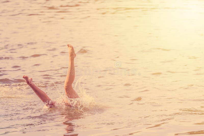 Girl Falling Jumping into the Water with Splash. Recreation Concept ...