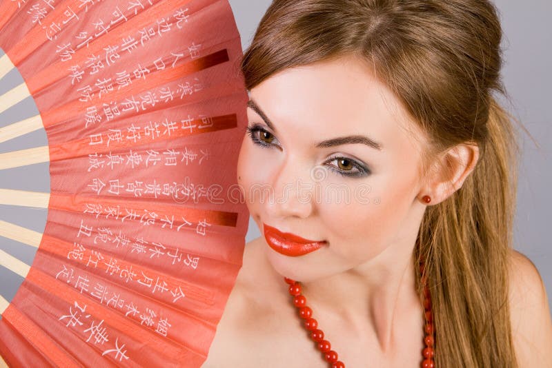 Girl with a fan stock photo. Image of lovely, elegance - 10991776