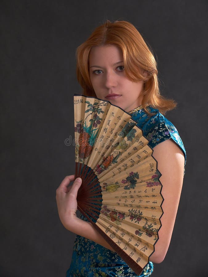 Girl on dandelion lawn stock image. Image of engrossed - 128441