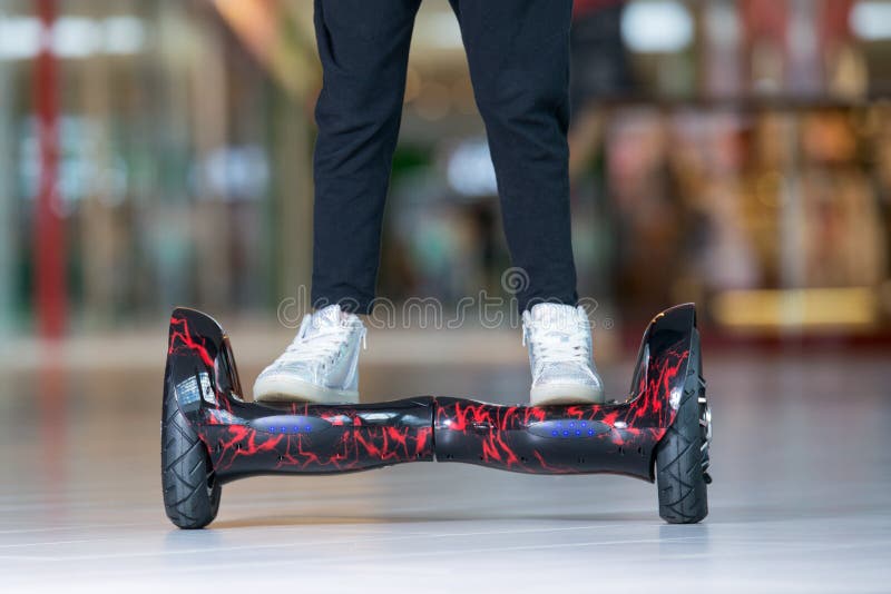 Girl Feet on the Hover Board. Self-balancing Scooter or Mini Segway ...