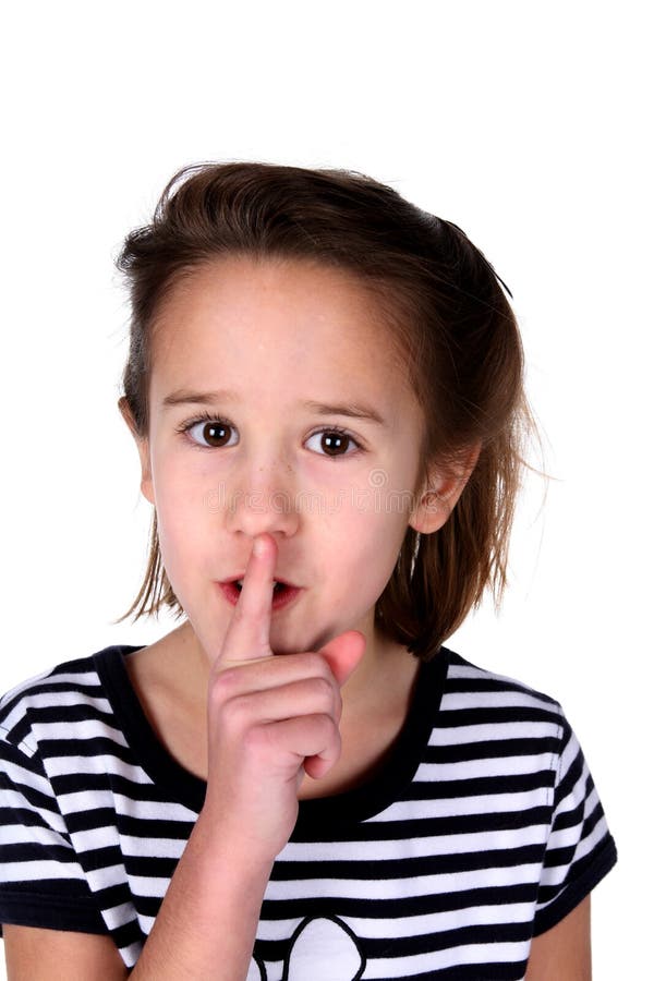 Girl With Finger Over Mouth Picture. Image: 8618121