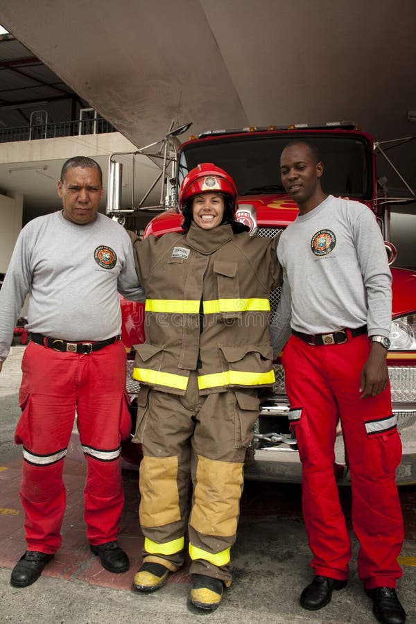 Girl in Fireproof Suit with 2 Firemen Editorial Image - Image of truck ...