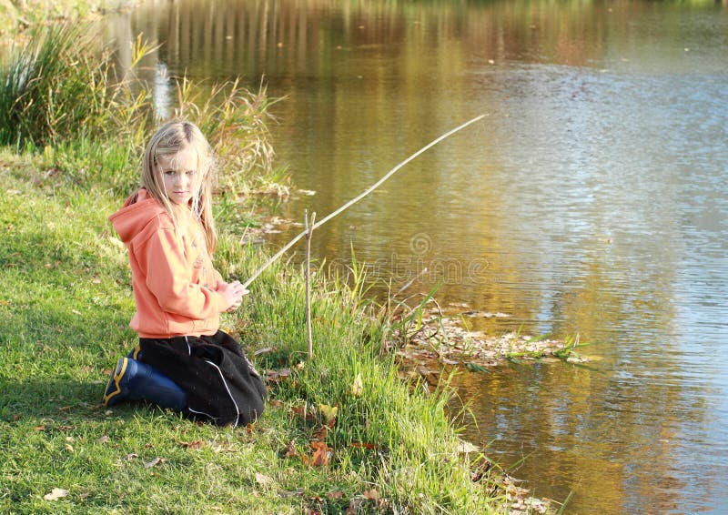 Girl fishing on pond stock image. Image of black, pull - 27557213