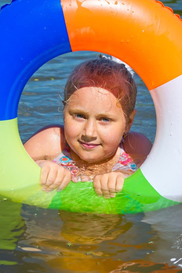 Girl floating in the river stock photo. Image of beautiful - 40969010