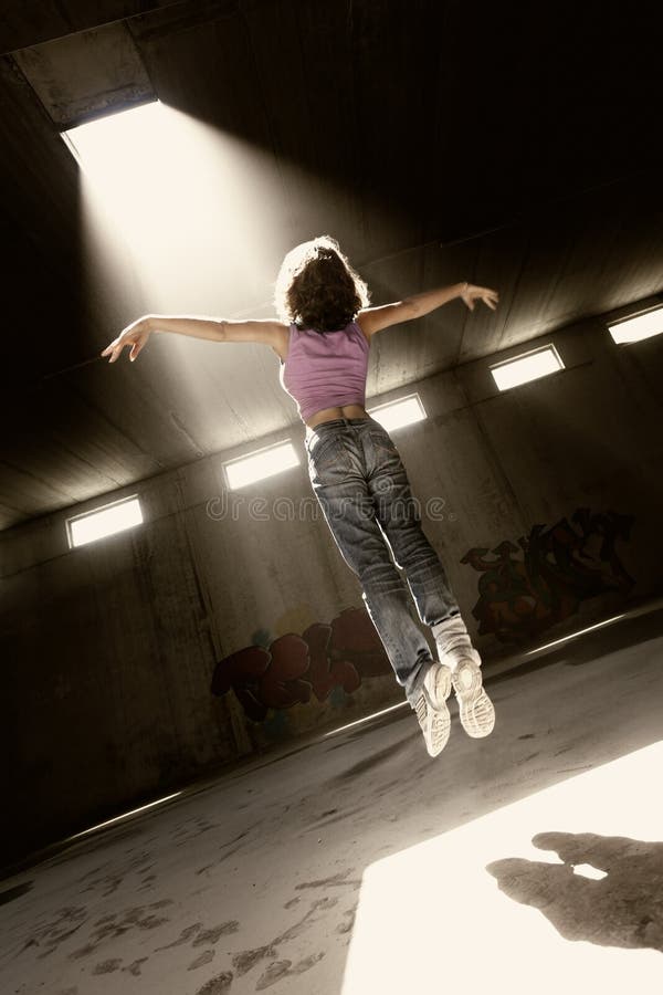 Girl Floating Up To Bright Light. Stock Photo - Image of hovering ...