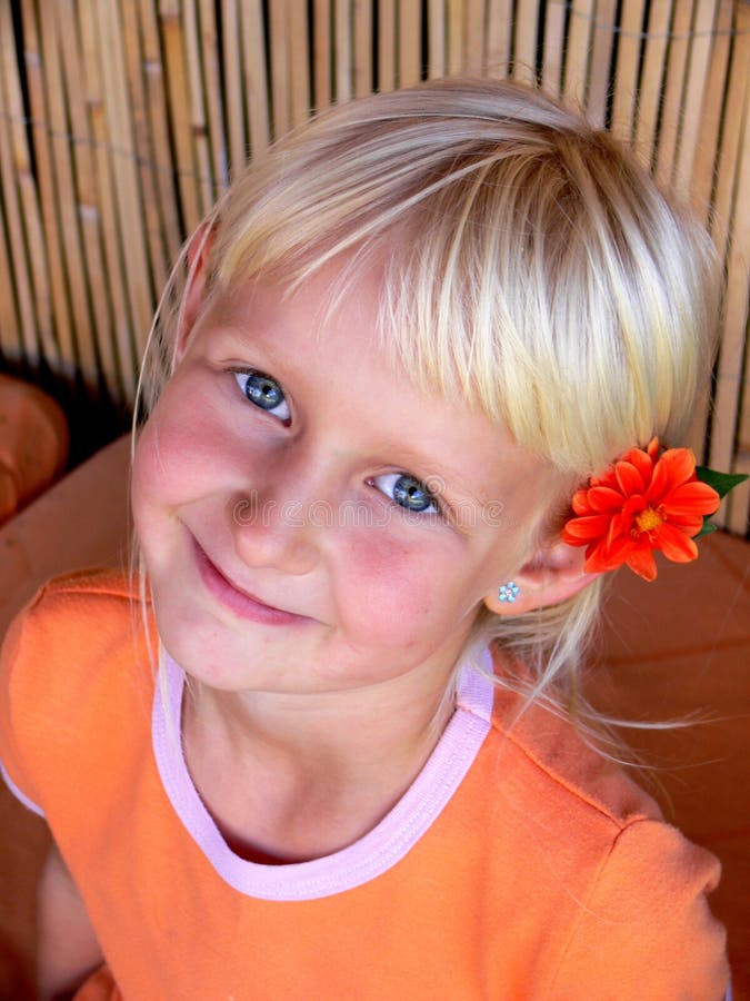 Girl with Flower Behind Ear Stock Image - Image of affection, adorable ...