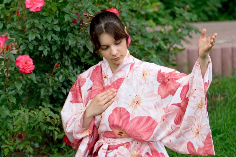 Girl in a flower yukata stock image. Image of pose, japanese - 7174367