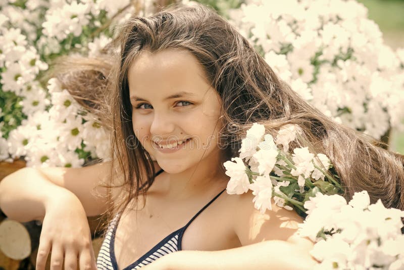 Girl in Flowers. Spring Blossom and Young Girl Stock Photo - Image of ...