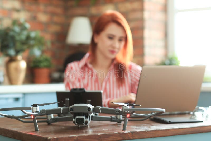 Girl with flying drone stock image. Image of fixing - 146287937