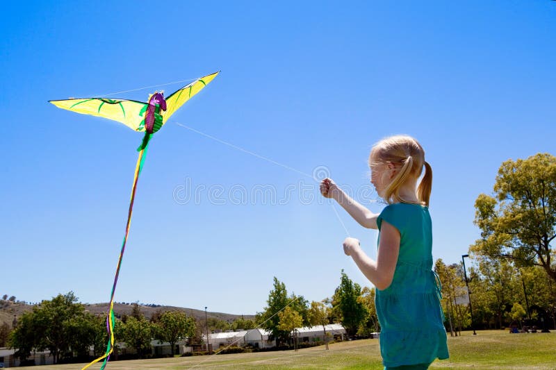 Girl flying a kite stock photo. Image of outdoor, cheerful - 14581616