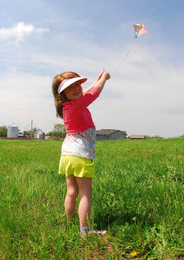 Girl flying kite stock photo. Image of outdoor, games - 25083990
