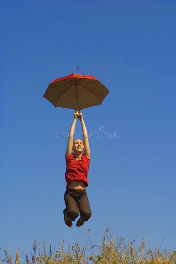 Girl Flying with Red Umbrella Stock Image - Image of blue, sport: 5621473