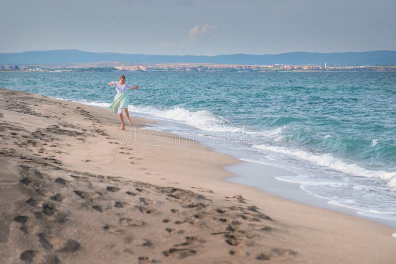Girl fun on the beach stock photo. Image of beauty, beautiful - 171082080