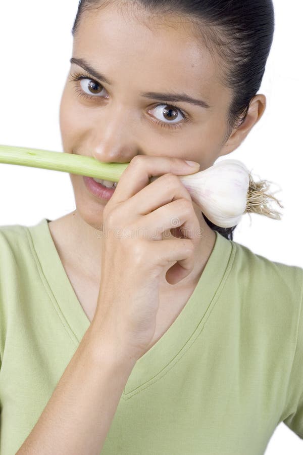 Girl with garlic stock photo. Image of clove, beige, cook - 2586744