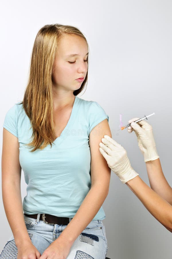 Girl getting flu shot stock photo. Image of hold, people - 21747904