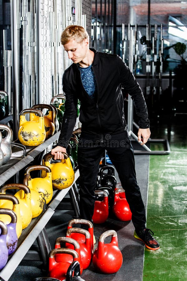 The Girl is Getting Ready for the Exercise with the Trainer Stock Image ...