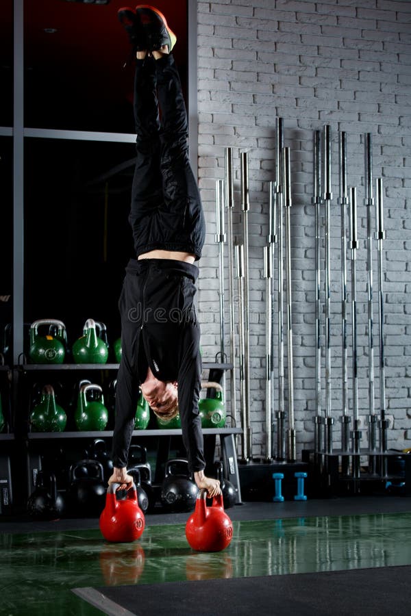 The Girl is Getting Ready for the Exercise with the Trainer Stock Image ...