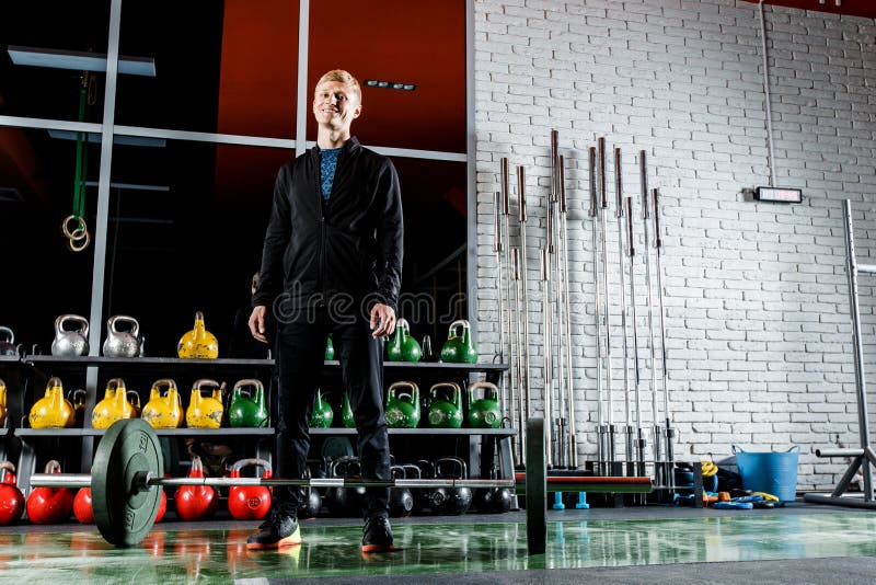 The Girl is Getting Ready for the Exercise with the Trainer Stock Image ...