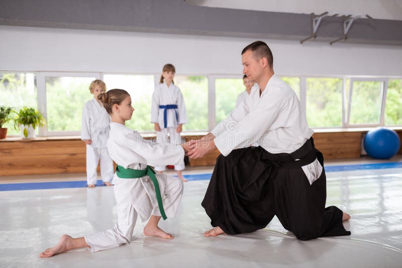 Girl Getting Ready for Practicing Aikido with Her Trainer Stock Photo ...