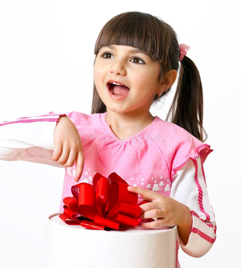 Girl with a gift stock photo. Image of childhood, emotions - 23938430