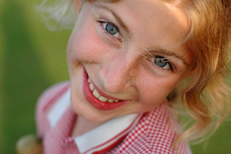 Girl giving cheeky smile stock image. Image of cute, adolescence - 5104803