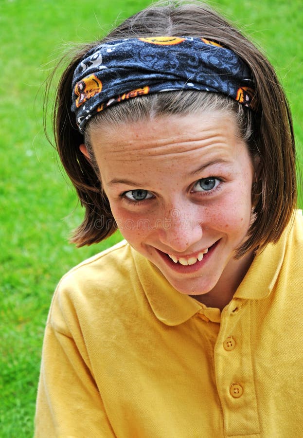 Girl giving cheeky smile stock image. Image of lighthearted - 5224989