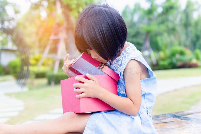 Girl Giving a Gift To Someone Special Stock Photo - Image of beauty ...