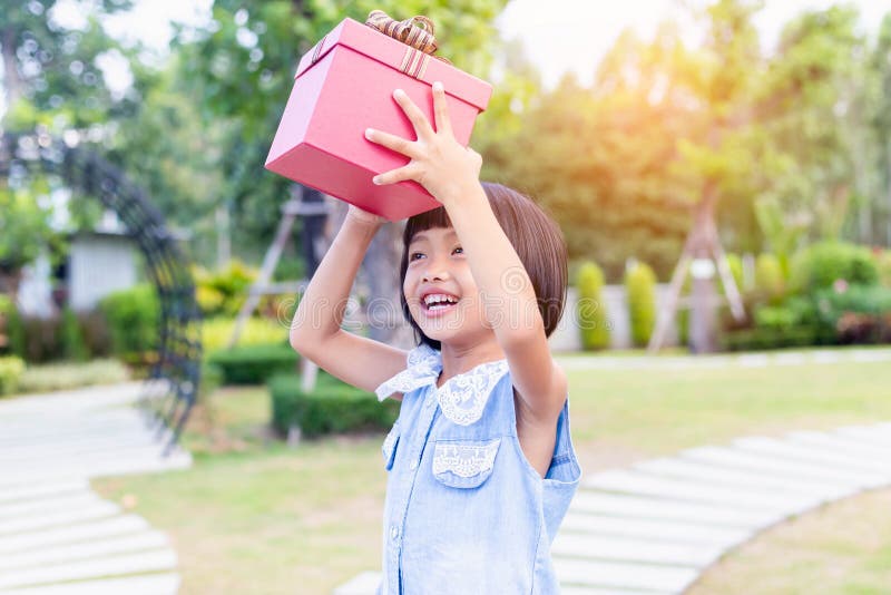 Girl Giving a Gift To Someone Special Stock Photo - Image of beauty ...