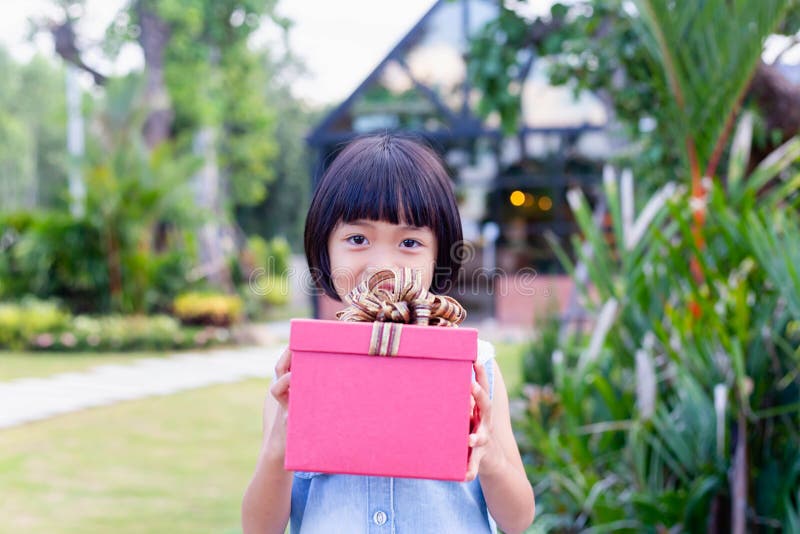 Girl Giving a Gift To Someone Special Stock Image - Image of nature ...