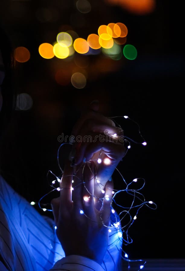 The Girl with the Glowing Lights in the Hands Stock Image - Image of ...
