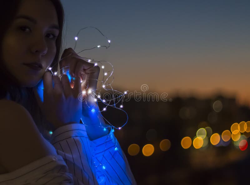 The Girl with the Glowing Lights in the Hands Stock Photo - Image of ...