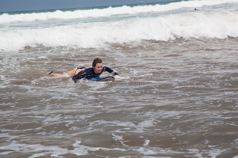 Girl Goes for a Drive on Waves on Bodysurf Stock Photo - Image of ...