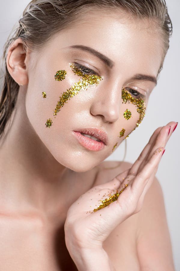 Girl with golden tear stock photo. Image of fashion, cute - 70455754