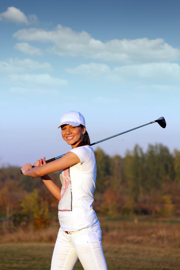 Girl golf player on field stock photo. Image of white - 30353662