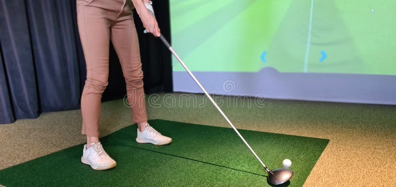 Girl Golf Player Plays Golf Indoors Closeup Stock Photo - Image of ball ...