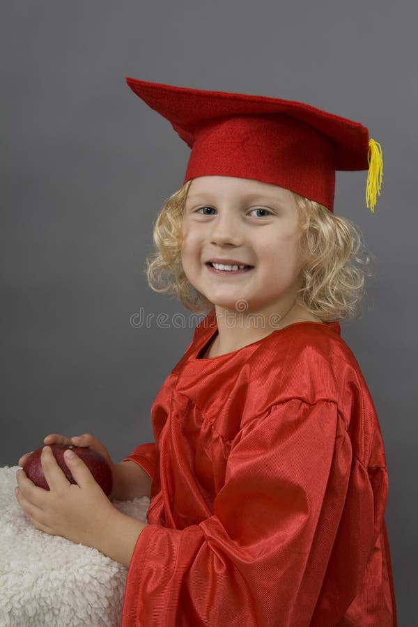 Girl in graduation uniform stock photo. Image of robe - 13337124