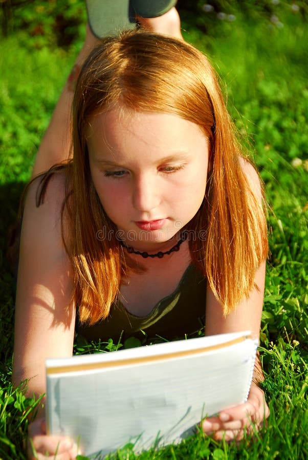 Child Reading Book or Bible Stock Image - Image of relaxing, pastime ...