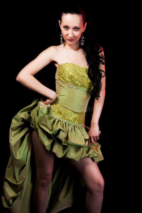 Girl in green dress stock photo. Image of tilted, dress - 9228940