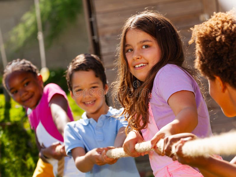 Girl in Group of Diverse Kids Pull Rope Play Game Stock Image - Image ...