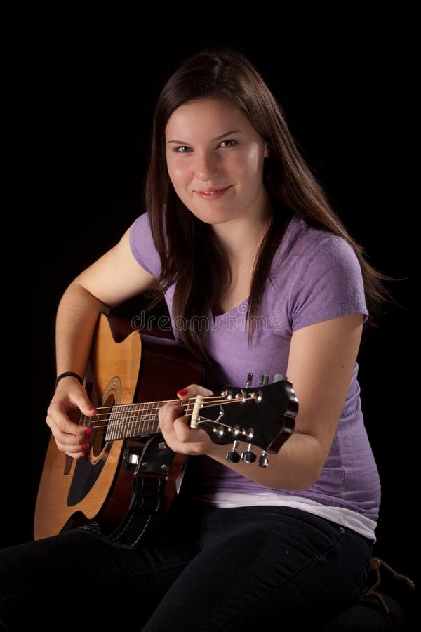 Girl with guitar stock photo. Image of playing, model - 27090850