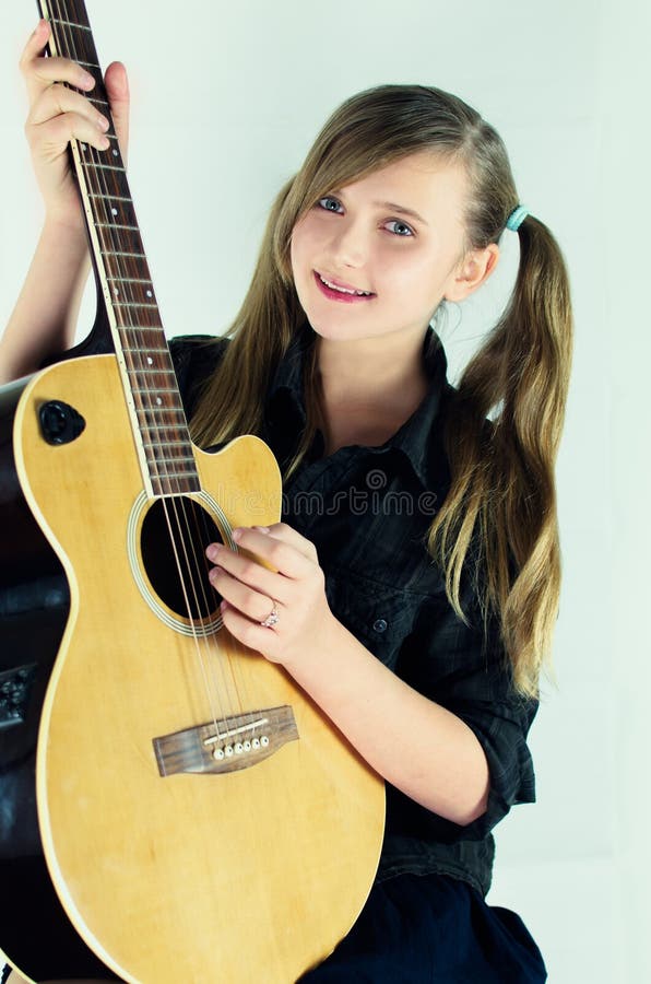 Girl with guitar stock photo. Image of girl, music, fashion - 49234110