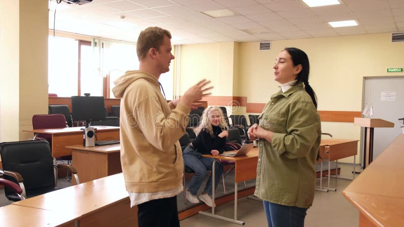 Hard of Hearing Graduates Communicate in Sign Language. Stock Footage ...