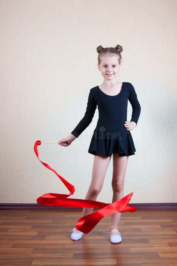 Girl Gymnast with Red Ribbon Stock Photo - Image of beautiful, human ...