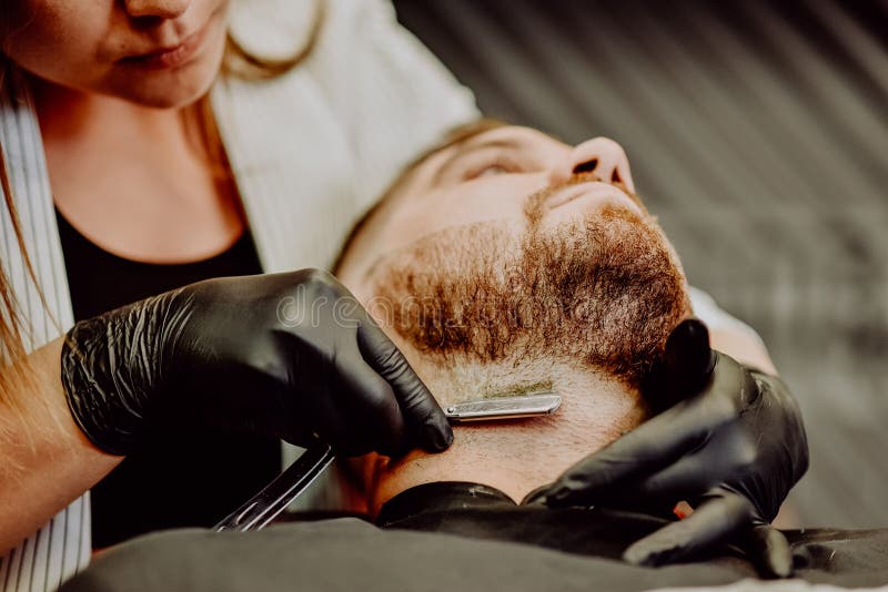 Girl Hairdresser Shaves His Beard with a Man Razor Stock Photo - Image ... Girl Hairdresser Shaves His Beard with a Man Razor Stock Photo - Image ...