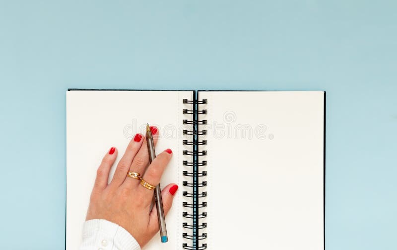 Girl Hand in a Notebook, Ready To Learning and Accomplish Objectives ...