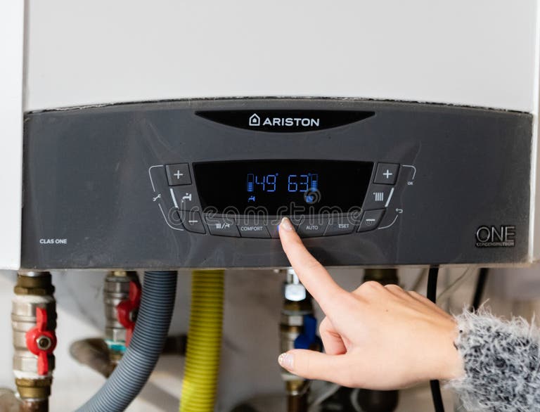 Girl Hand Setting Temperature To Heating System. Central Heating ...