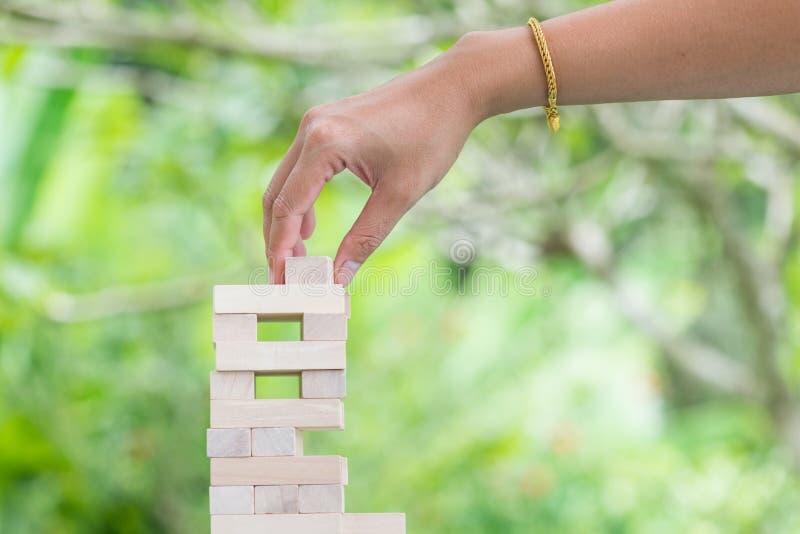 Girl hand take one block stock image. Image of development - 98060307
