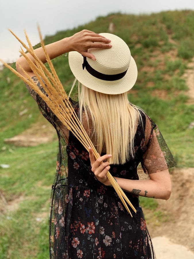 Girl in a Hat from the Back with Spikelets in Spring Stock Image ...