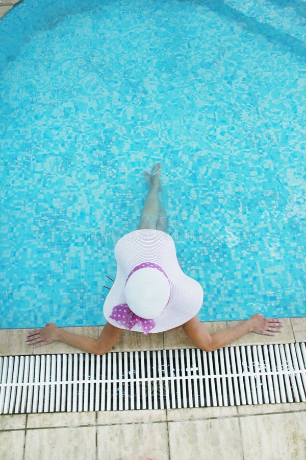 Girl in a Hat in the Water Pool Stock Photo - Image of beach, swimming ...