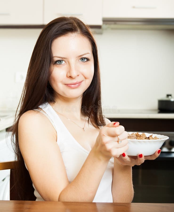 Girl Having Breakfast in Kitchen. Stock Photo - Image of cuisine ...